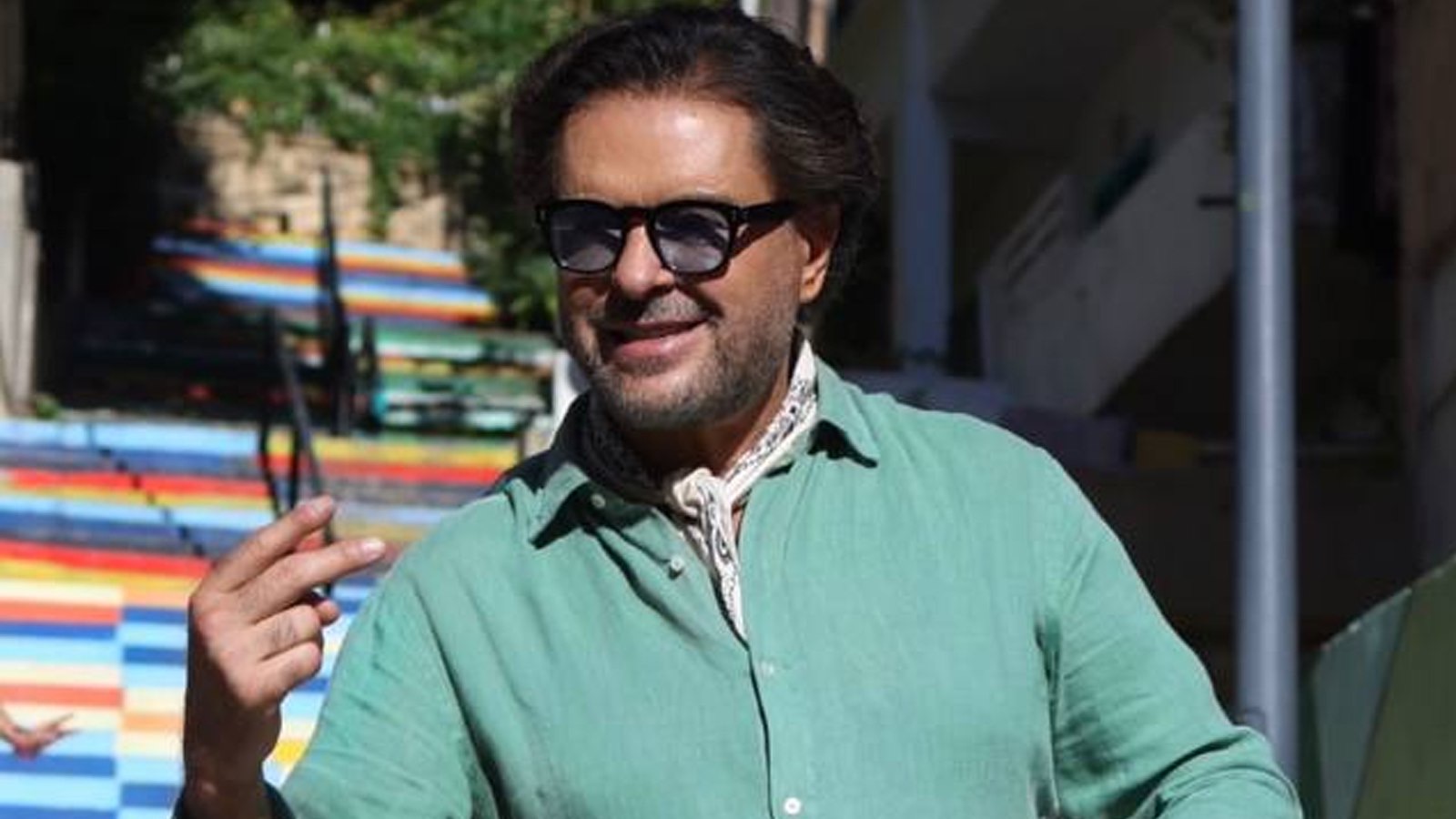 A bold fan surprises Ragheb Alama with a distinctive tattoo and kisses ...