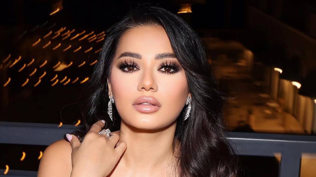 Rahma Riad shines in a shiny dress and attractive makeup